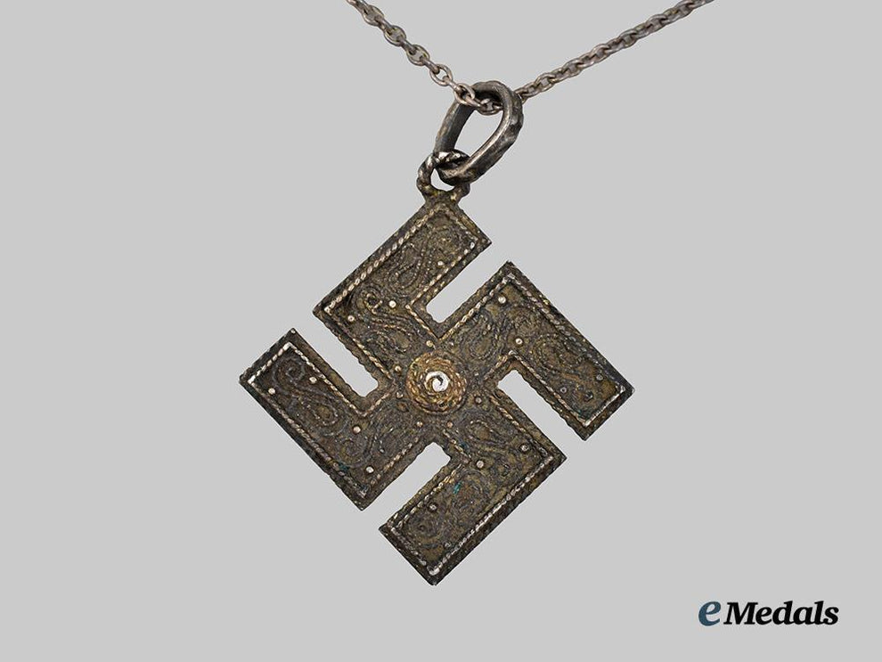 Germany, Third Reich. A Germanic Folk Art Swastika Pendant in Silver ...